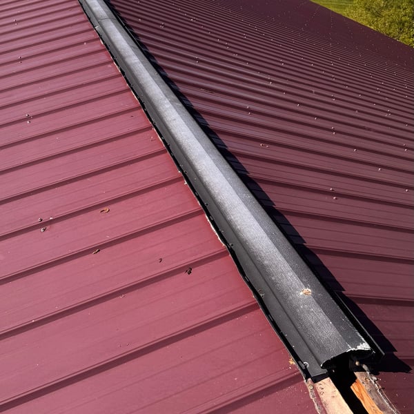 Aluminum vs. Steel: Which Ridge Cap is Best for Your Pole Barn?